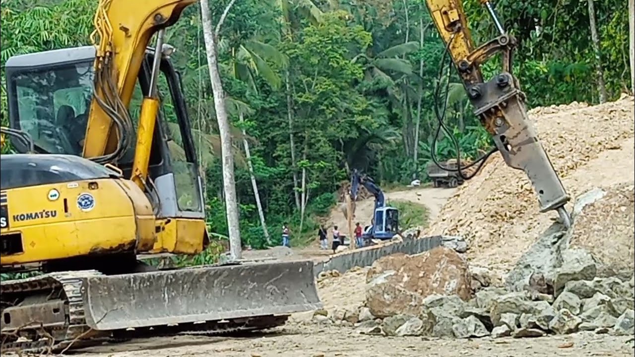 Excavator Komatsu PC78US Komatsu PC75UU Working On The New Road ...