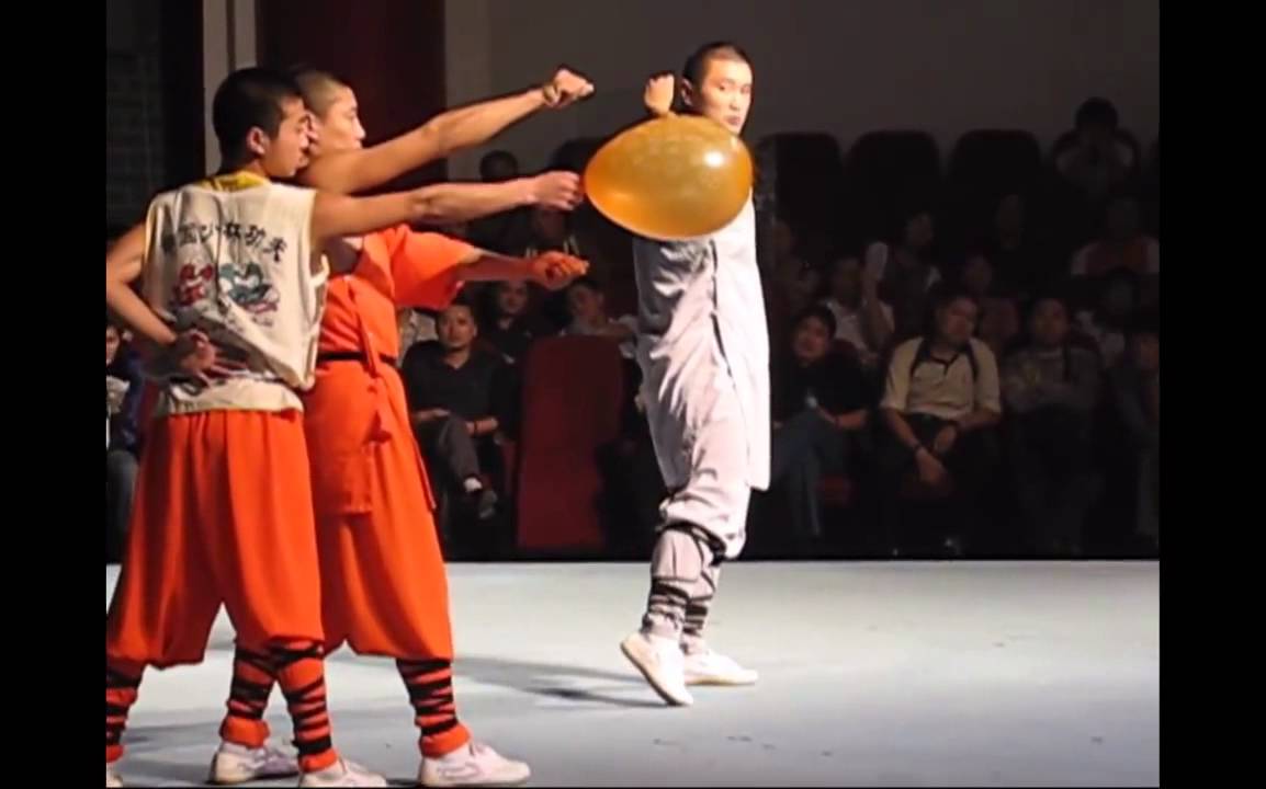 shaolin monk breaking glass with needle ... incredible Kung Fu skills ...