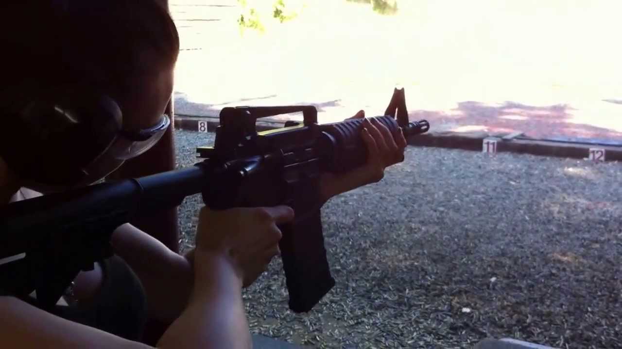 Girl Shooting A Norinco CQ-A1 M4 AR-15 Semi Auto Carbine With The 10 ...