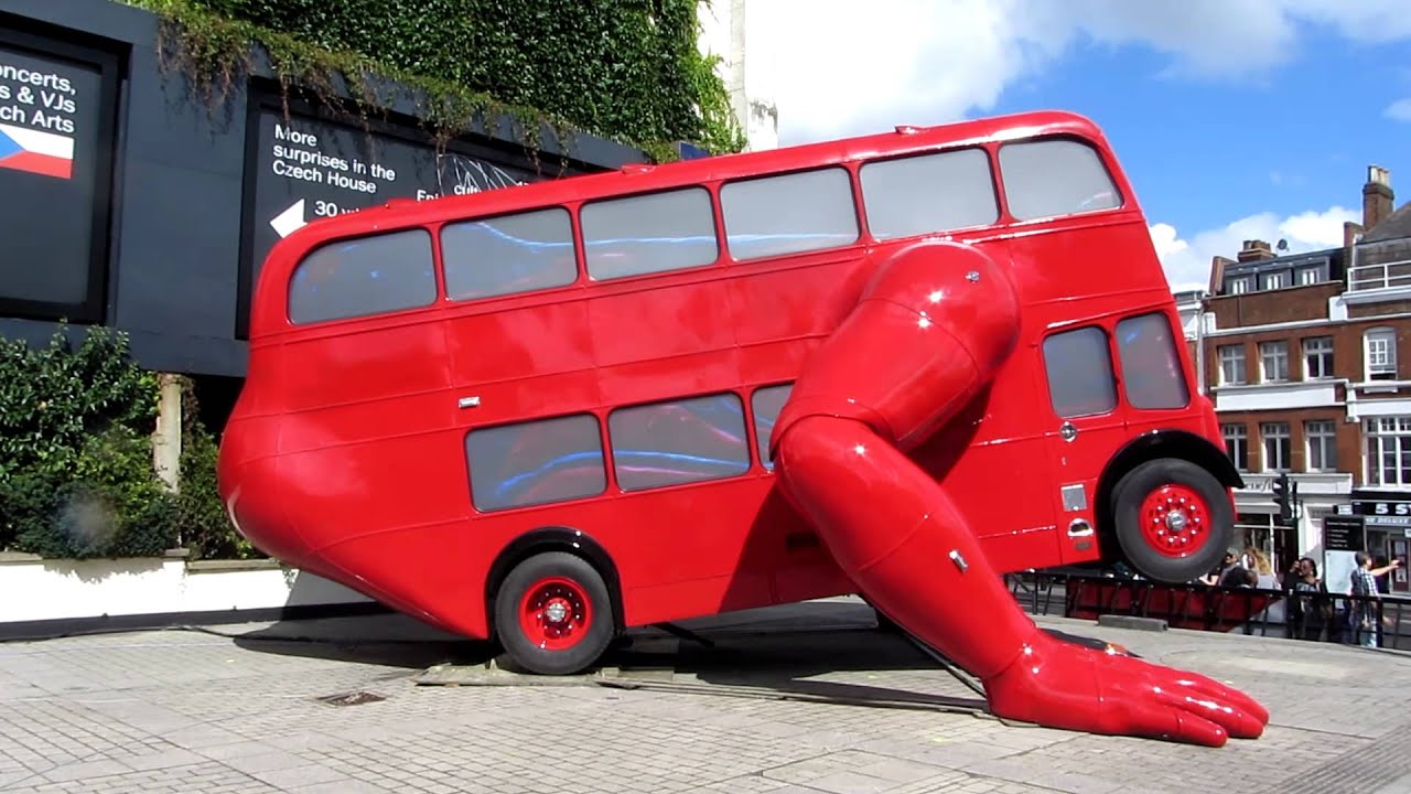 Olympics 'London Booster Bus' doing push-ups at Islington - YouTube