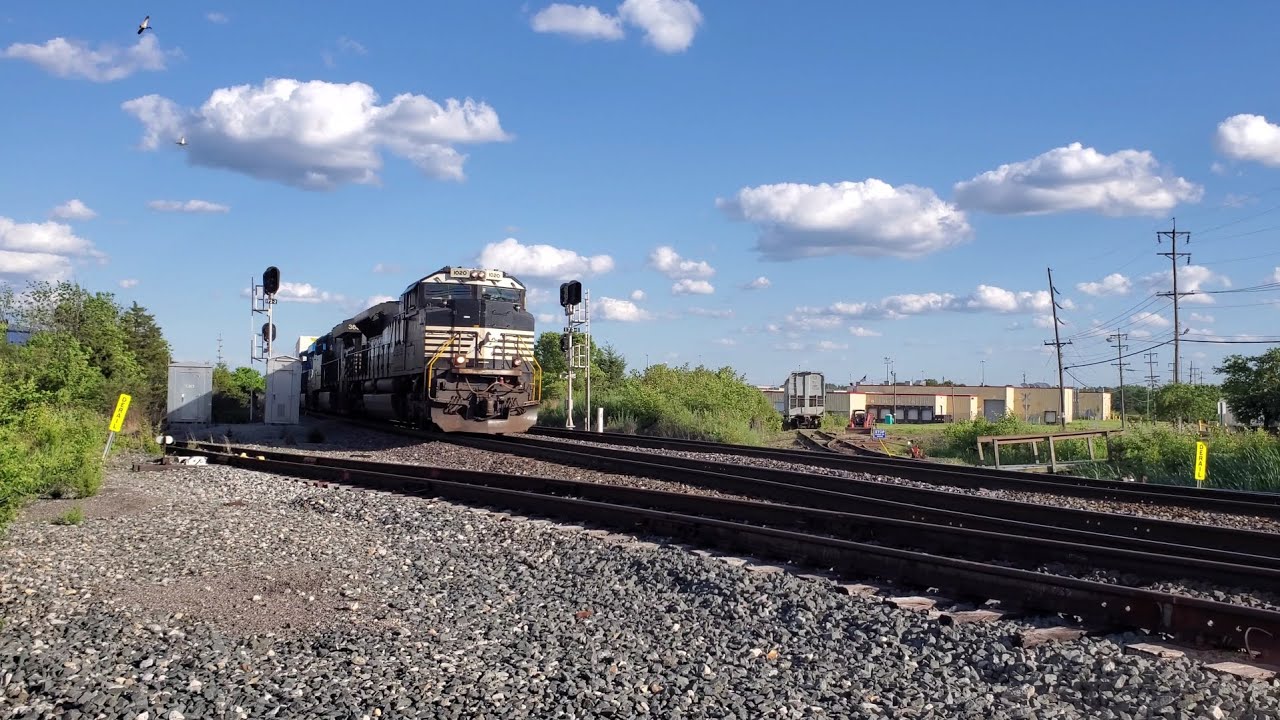 NS 1020 leads 28c with NS 8098 "Conrail" trailing 3rd through ...