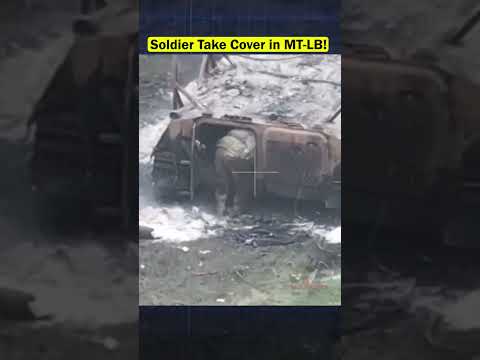 Russian Soldier Seeks Shelter in Burning MT-LB as Drone Watches