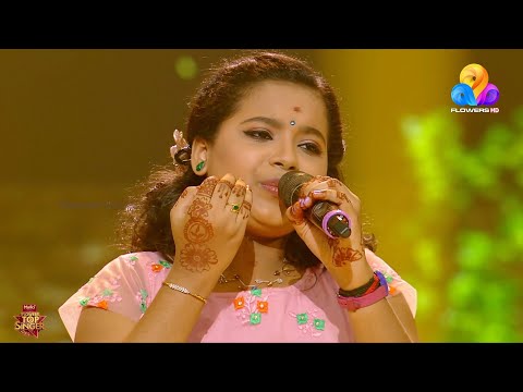 തിരിച്ചു കിട്ടാത്ത ഒരുപാട് ഓർമ്മകളെ തഴുകി ഉണർത്തുന്ന ഗാനാലാപനം