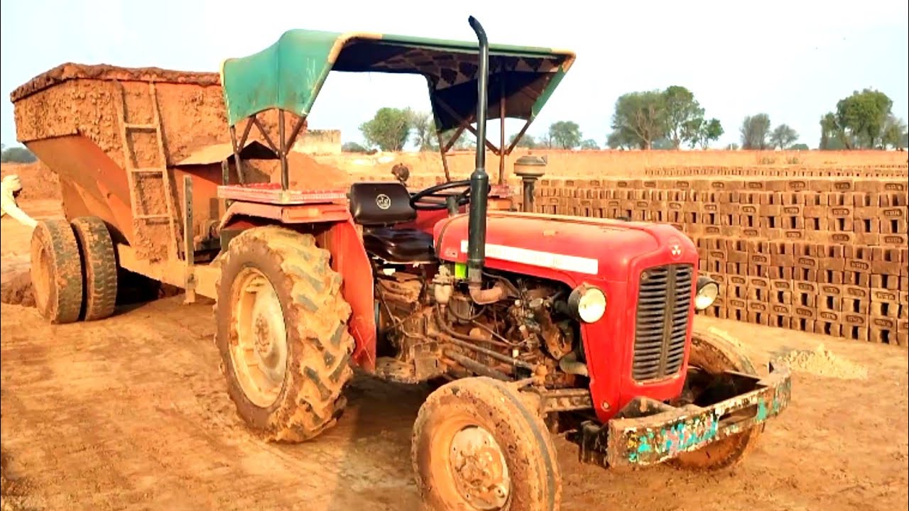 Massey Ferguson 1035 Tractor Loading Mud in Bricks Soling Machine ...