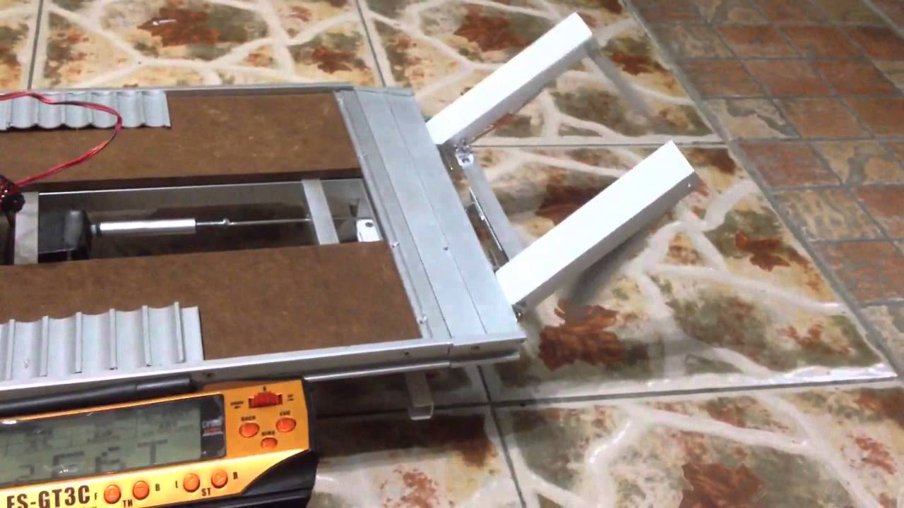 Home made trailer ramp remote with linear servo - YouTube
