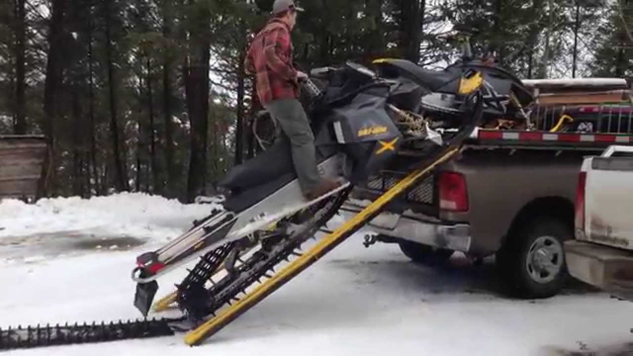 Loading a snowmobile - YouTube