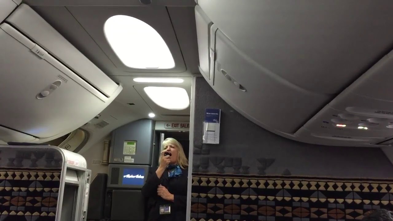Singing Flight Attendant - YouTube