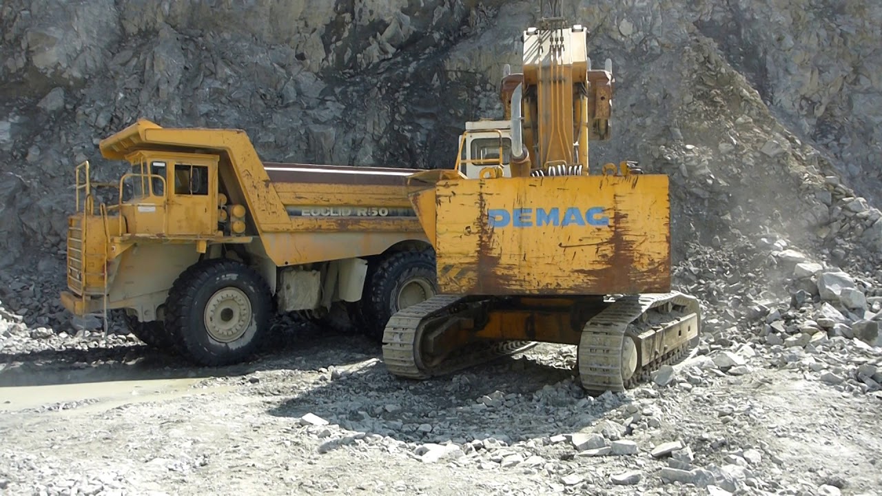 Demag H65 front shovel loading an Euclid R50 truck - YouTube
