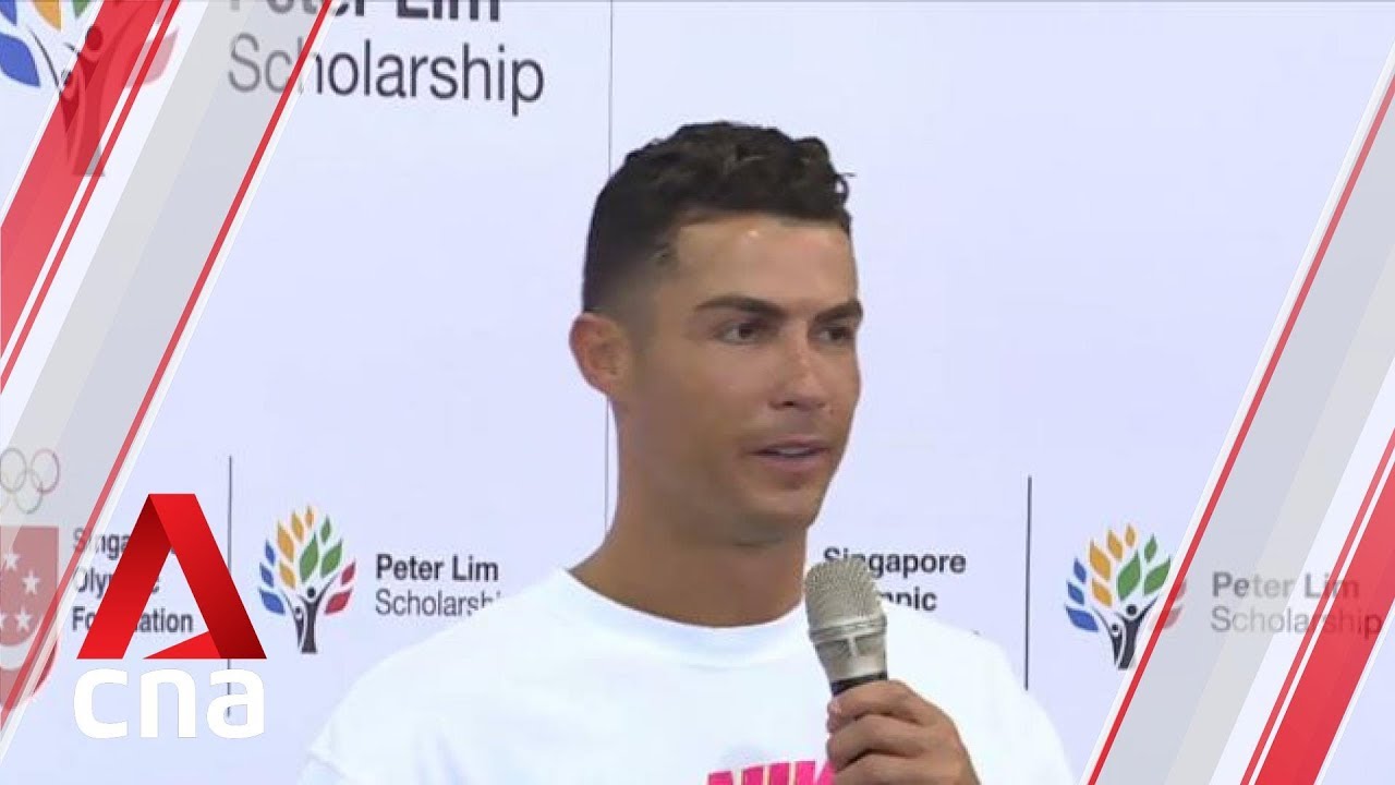 Football superstar Cristiano Ronaldo visits local primary school - YouTube