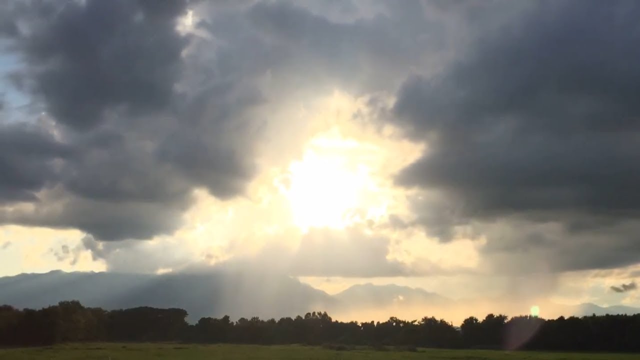 Sun while raining time lapse - YouTube