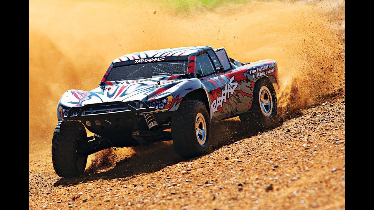 Traxxas SLASH 2X4 on frozen baseball field - YouTube