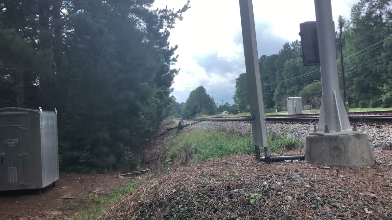 CSX 7784 and CSX 2704 w/ loud K5LA leading 26 car train into Maxwell ...