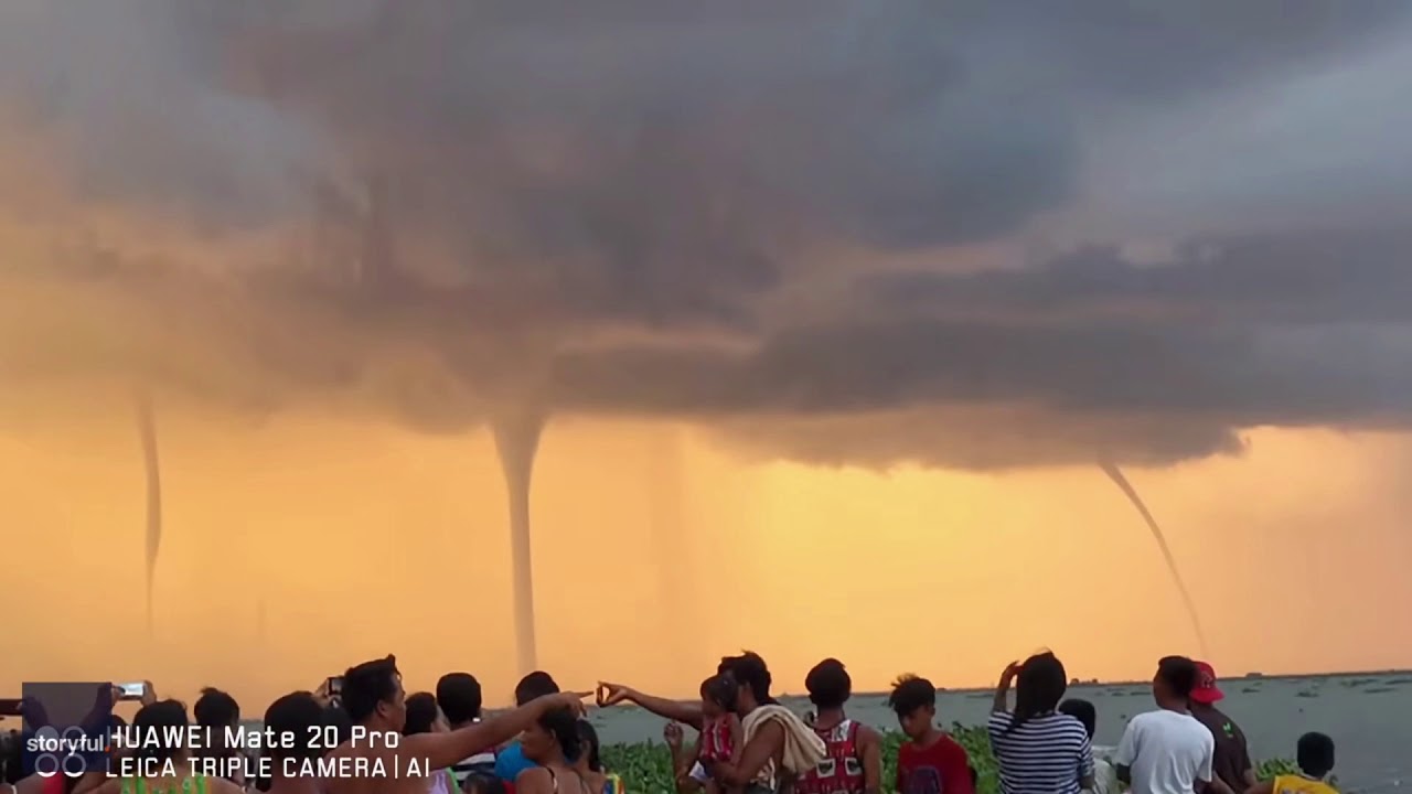 Four Waterspouts in Front of a Sunset Amaze Onlookers in Laguna de Bay ...