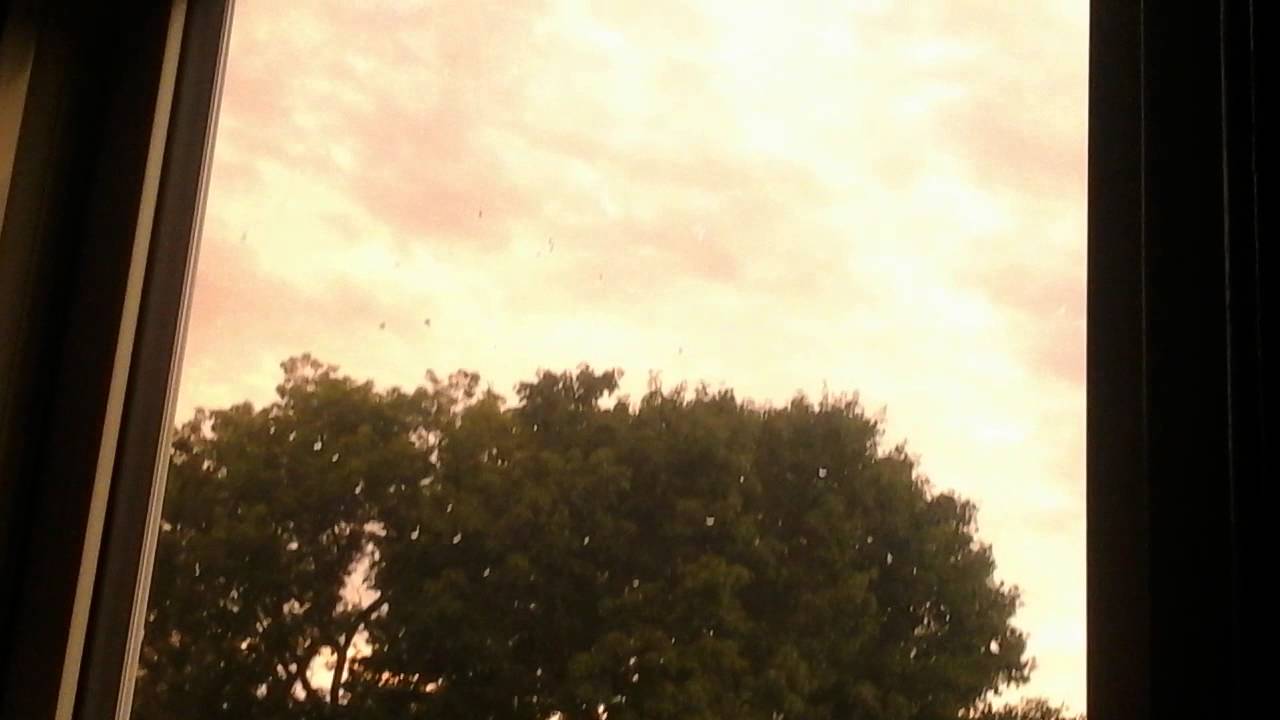 Yellow sky phenomenon after thunderstorm? - YouTube