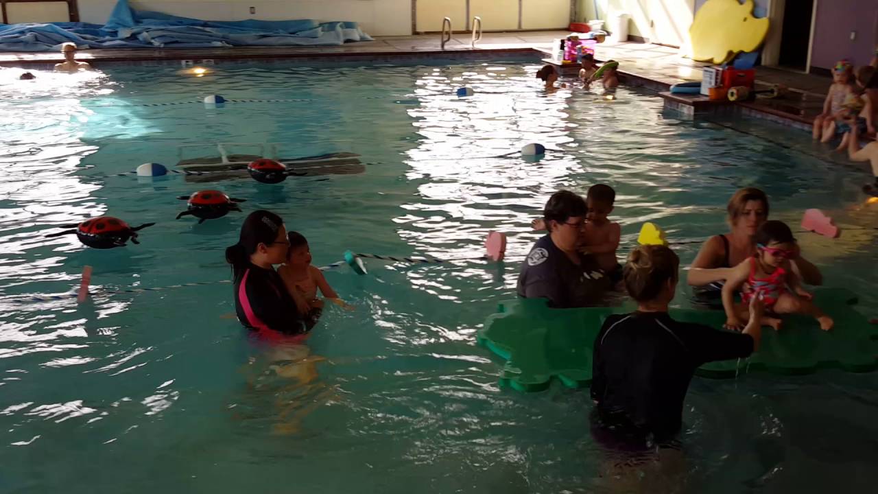 Shellie and her swim buddy doing swims off the float.... - YouTube