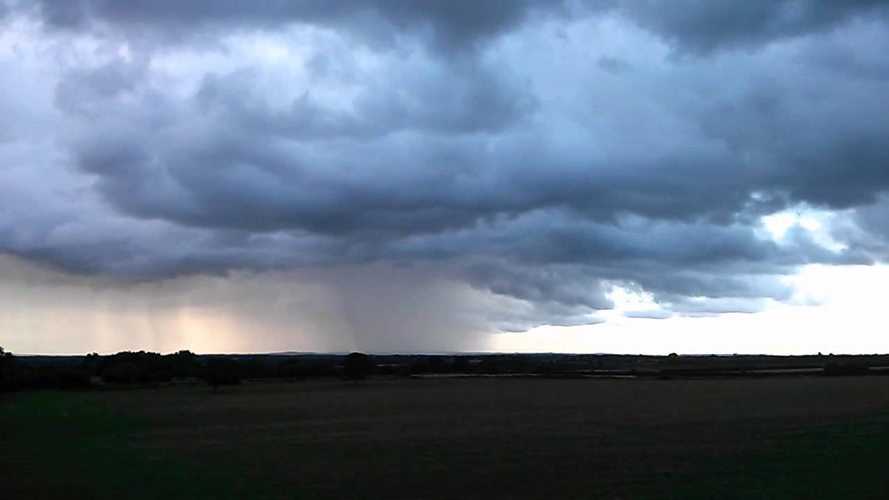 Rain clouds rolling overhead. - YouTube