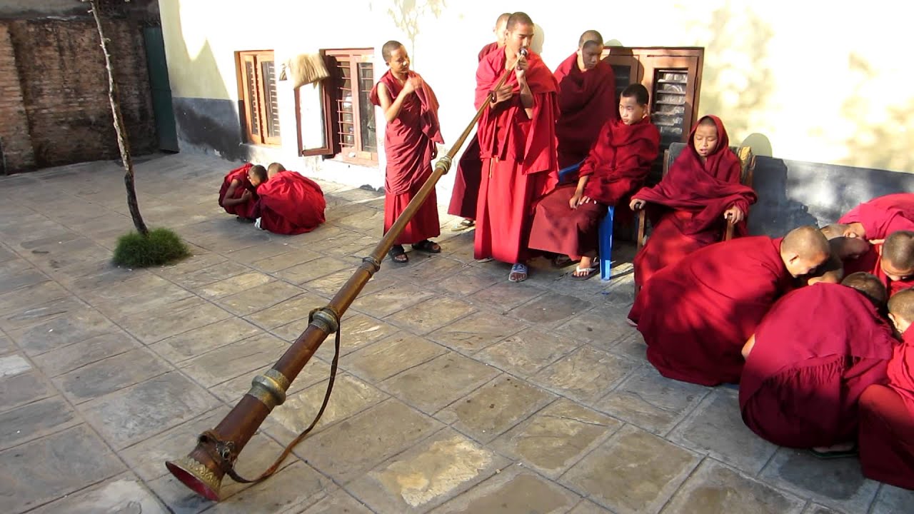 Young Tibetan Monks Learning to Play the Dungchen Horn - YouTube