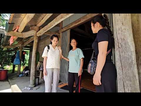 Trang wants to leave Vinh's house, and Vinh's mother is trying to stop her.