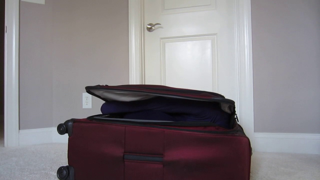 morphsuit suitcase contortion - YouTube