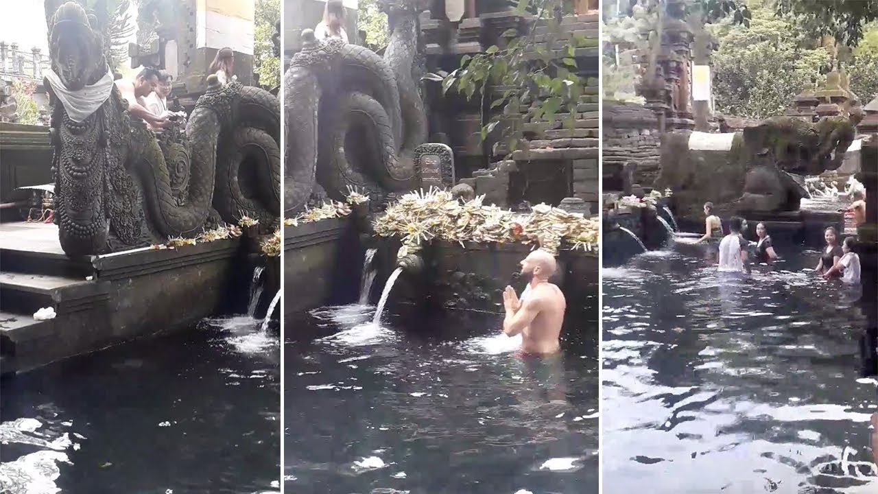 Tourists Bathe In Holy Water In Bali - YouTube