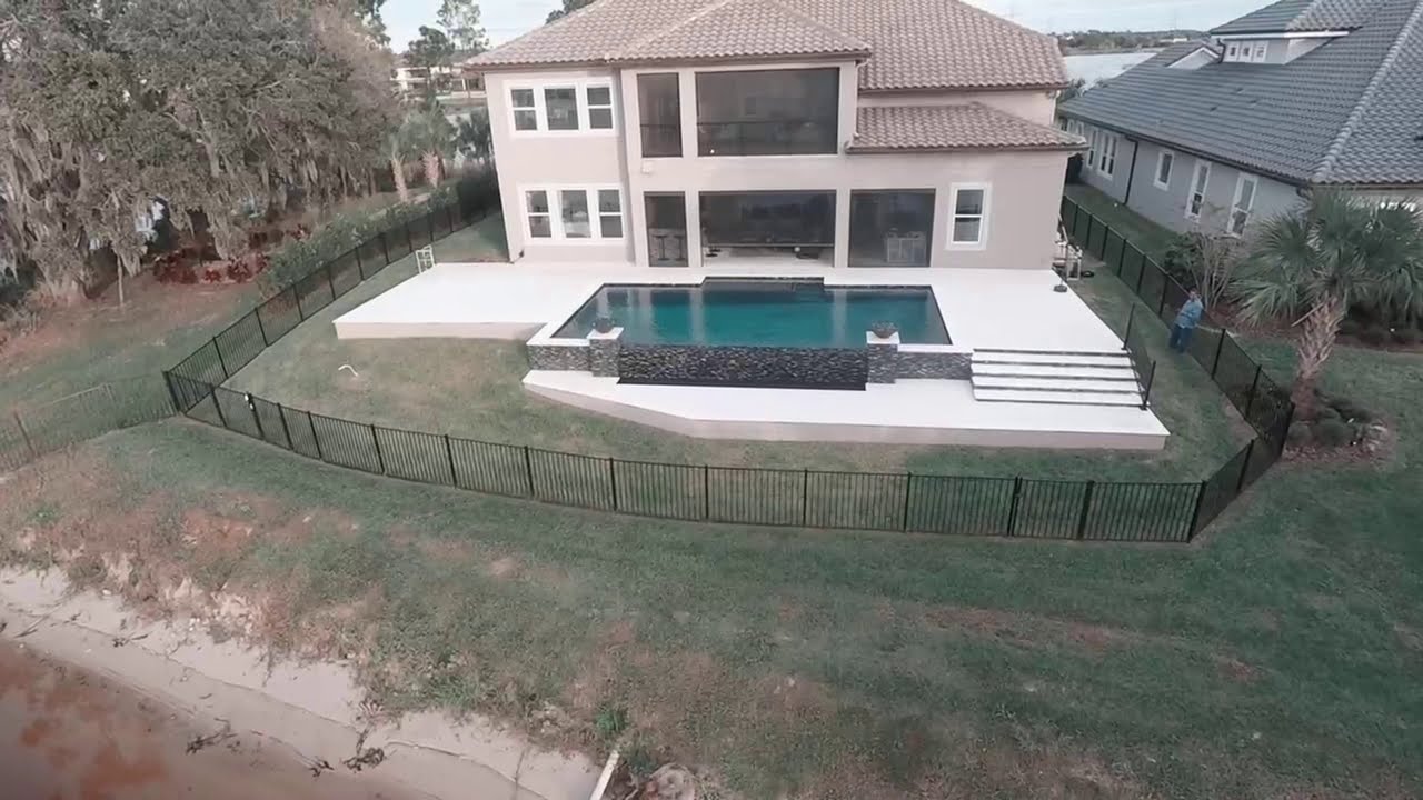 White Limestone Infinity Edge Pool Build Results - YouTube