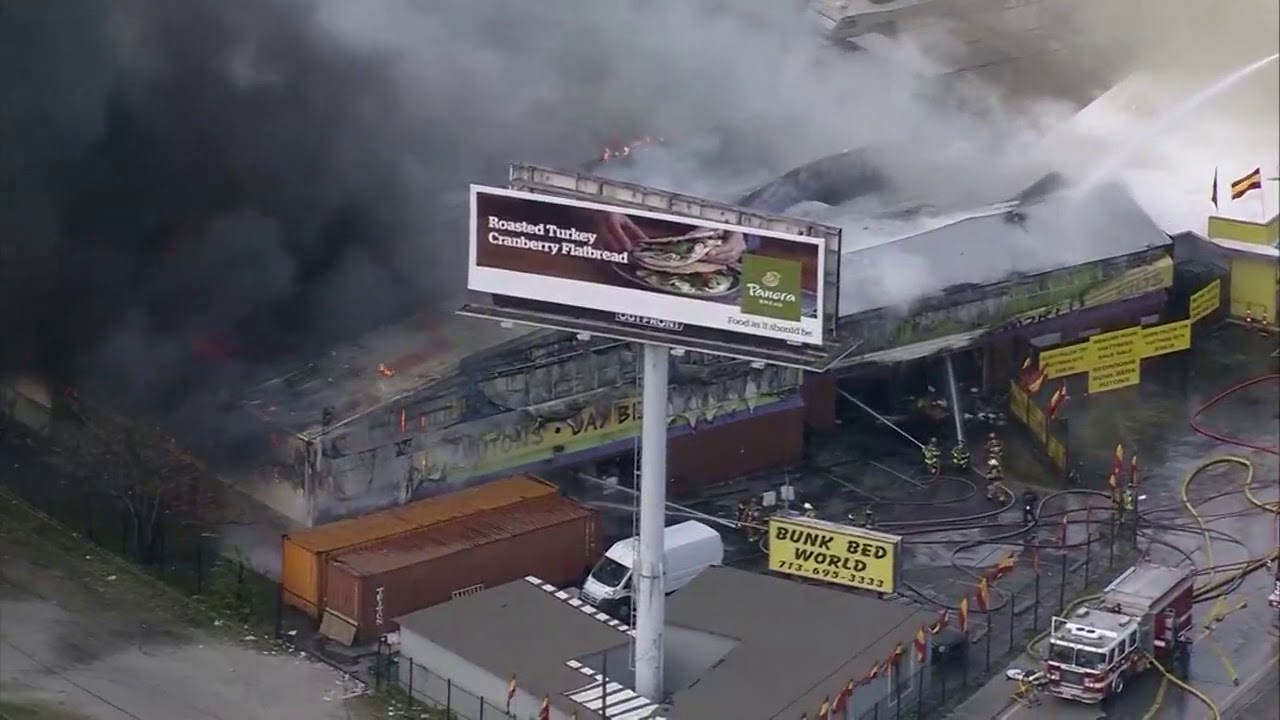 RAW AERIALS: Huge furniture store fire on I-45 - YouTube