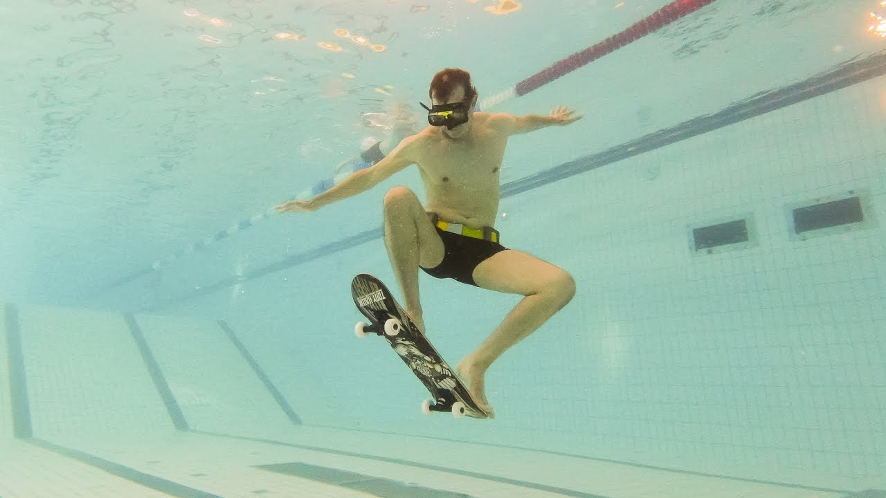Man Skateboard underwater in deep pool - YouTube