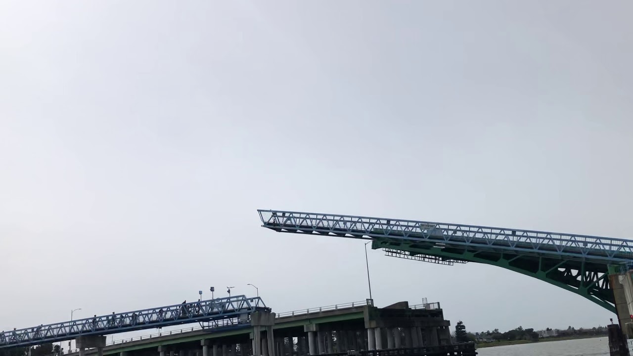 Sailboat Rainbow Sailing Through Bay Farm Drawbridge - YouTube