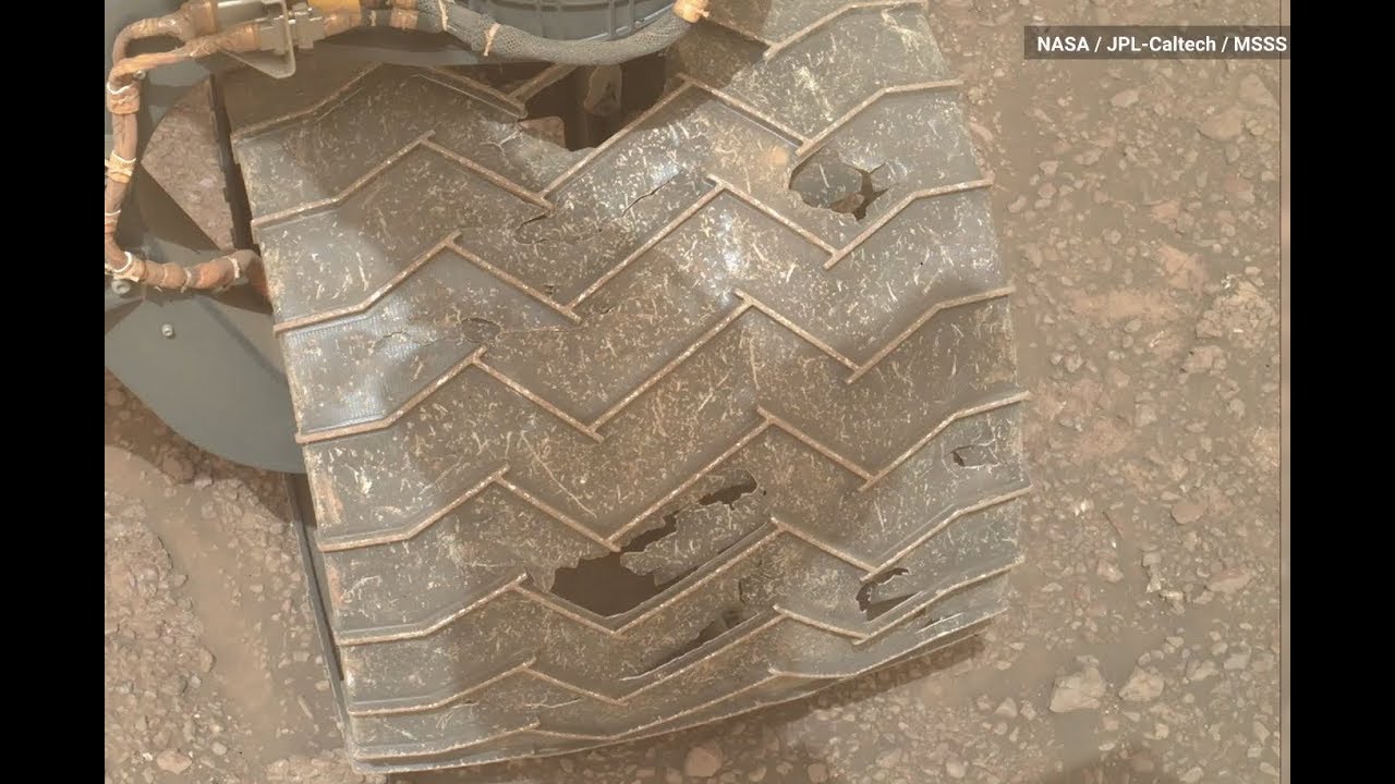 Mars Wear and Tear: Curiosity Snaps New Photos of Wheel Damage - YouTube