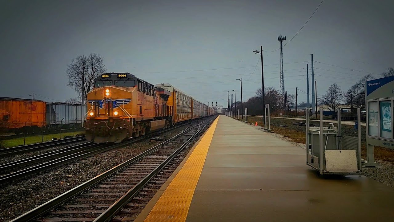 Up 8004 leading an eastbound Autorack past Elkhart station - YouTube