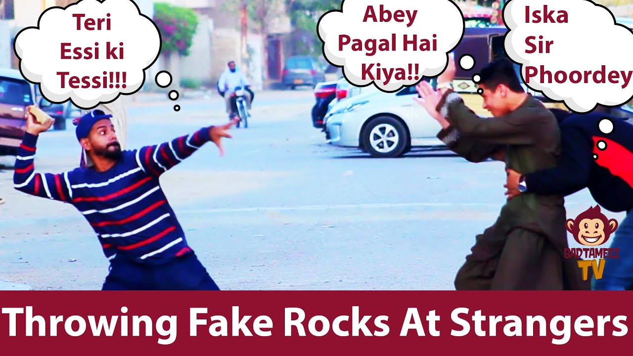 Freaking people out by throwing Fake Rocks | Rock Prank | Dodging and ...