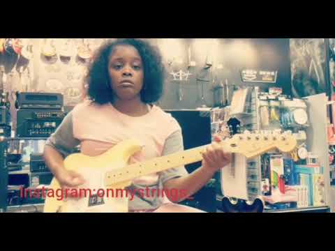 Female guitarist trying out fender - YouTube