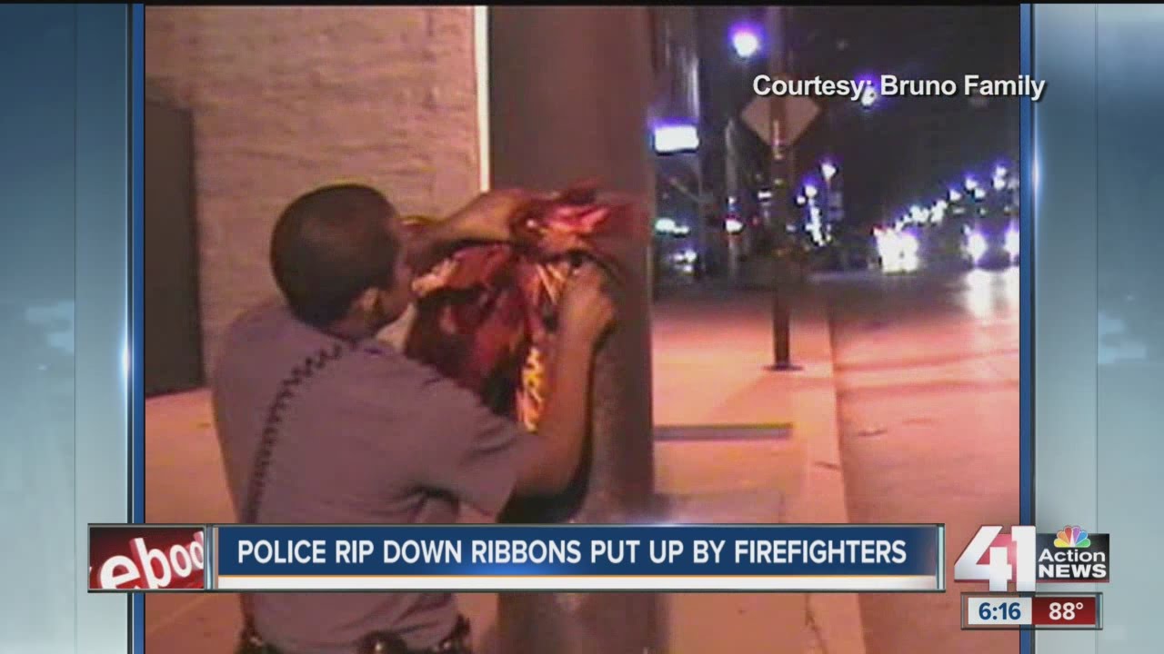 KCPD caught on tape taking down ribbons - YouTube