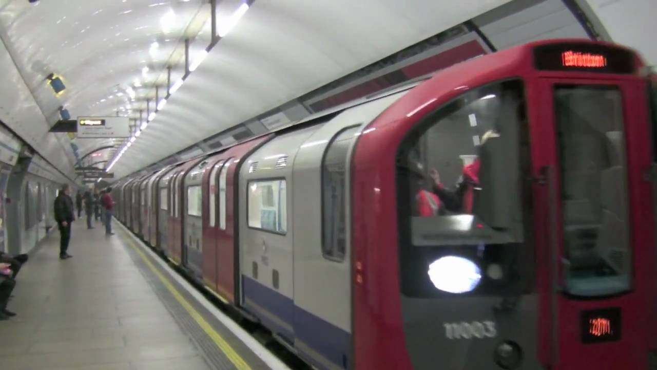 Victoria line 2009 Stock arriving at Seven Sisters - YouTube