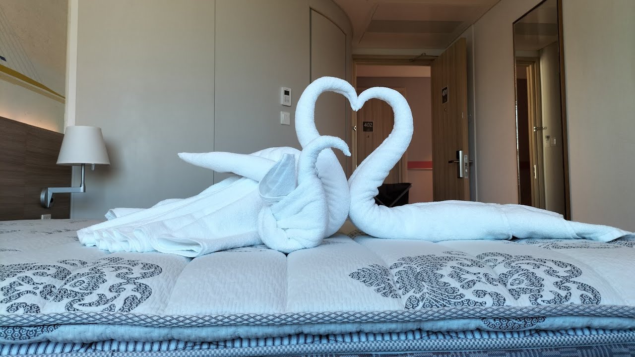 How To Make A Towel Swan That stands Up Well Towel Art Towel Origami how-to-make-a-towel-swan-that-stands-up-well-towel-art-towel-origami