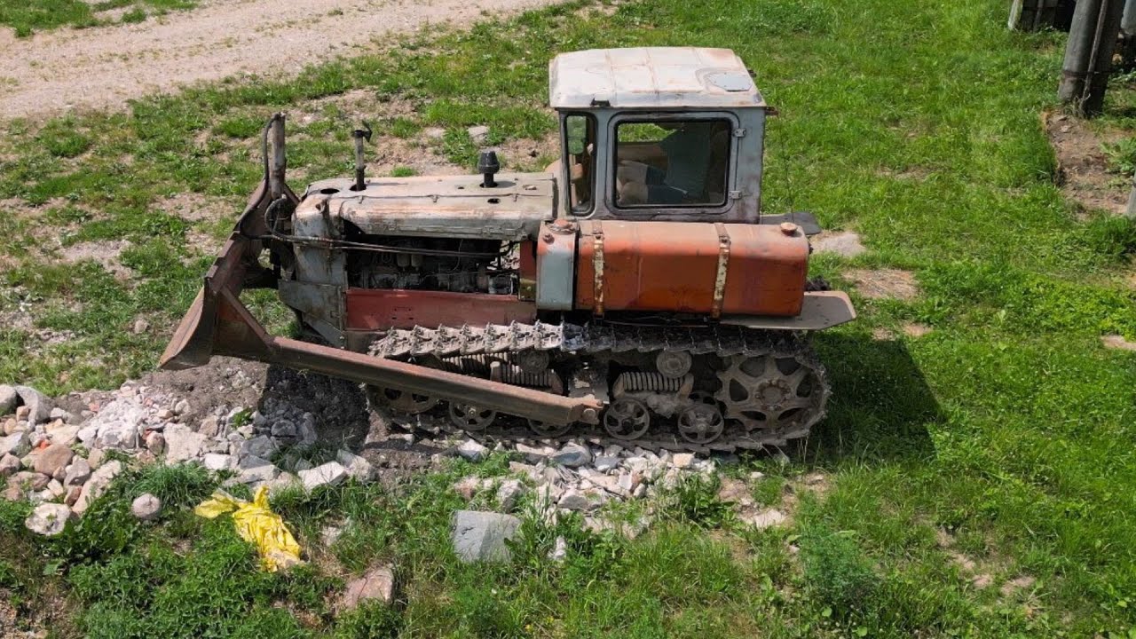 Crawler dozer DT75 crushing concrete and bricks - YouTube