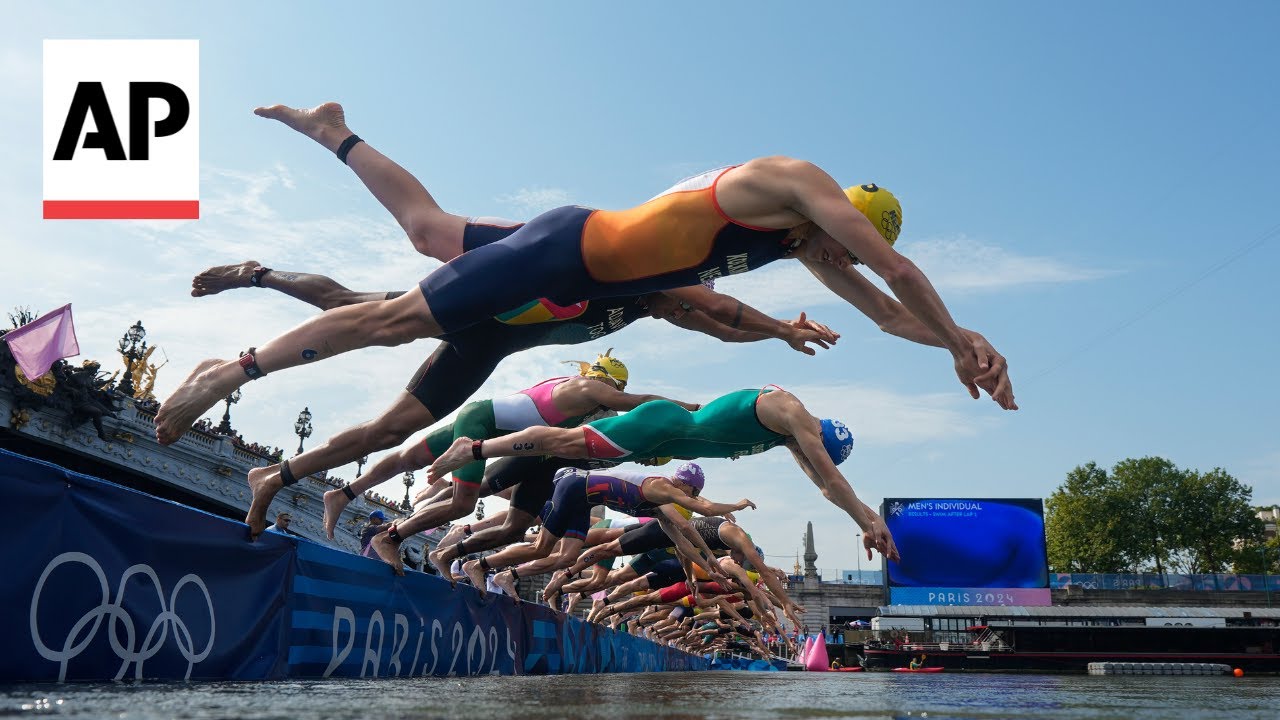 AP photographer explains what it's like capturing triathlon swimming ...