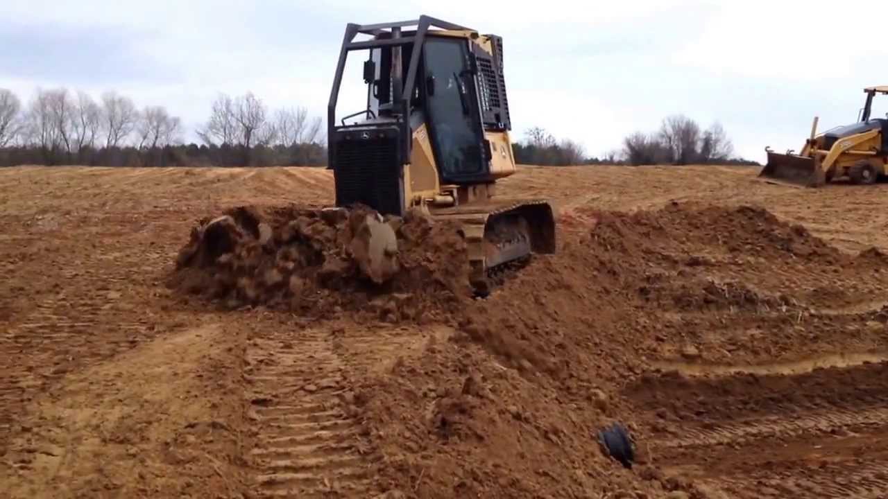 Dozer Backfilling Pipe. - YouTube