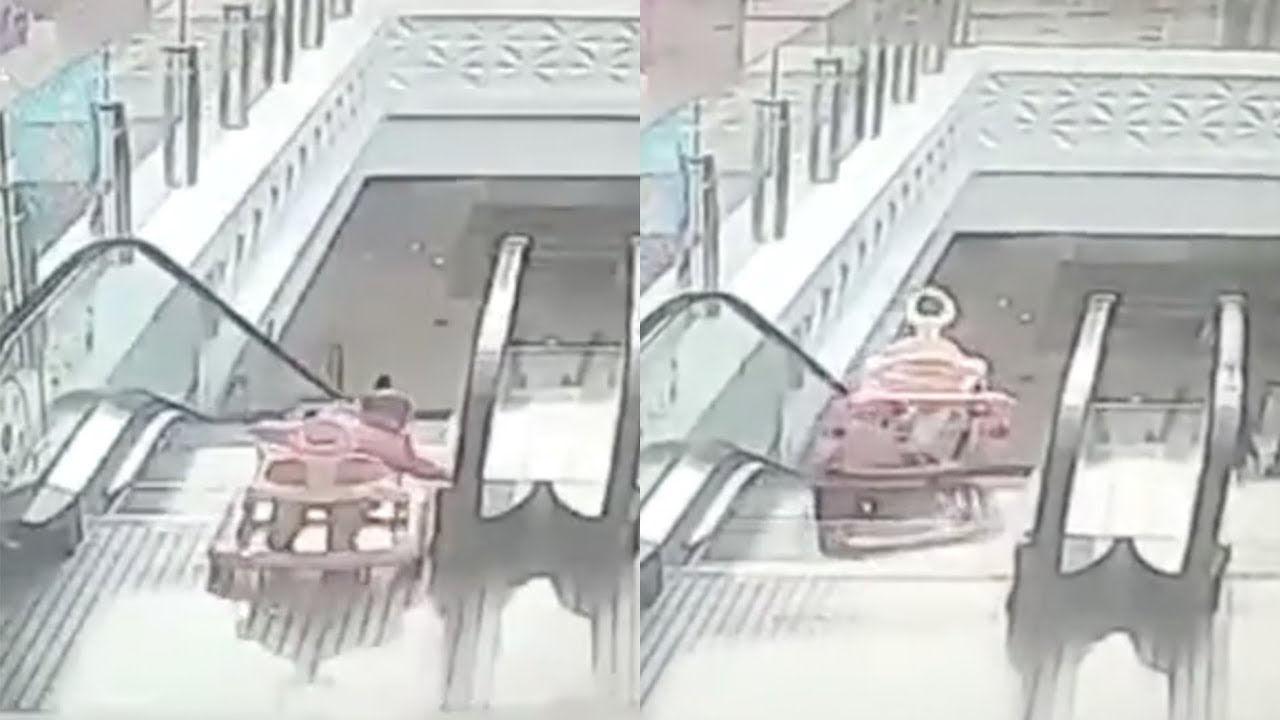 Heart-stopping moment after toddler falls on escalator - YouTube