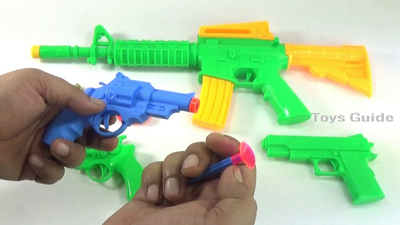 Box of Toys with 4 Green Colored Toy Guns - Toys Guide - YouTube