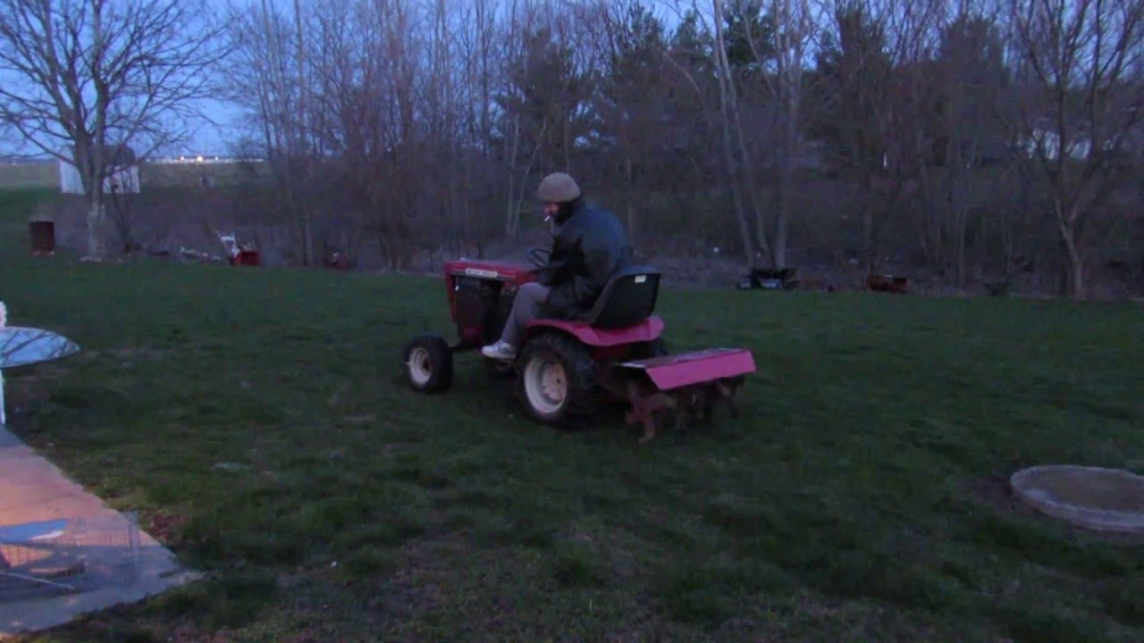 Wheel horse charger 12 busting ground with 36 inch tiller - YouTube
