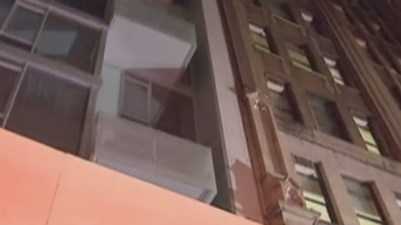 New York student rescued after being trapped between two walls - YouTube