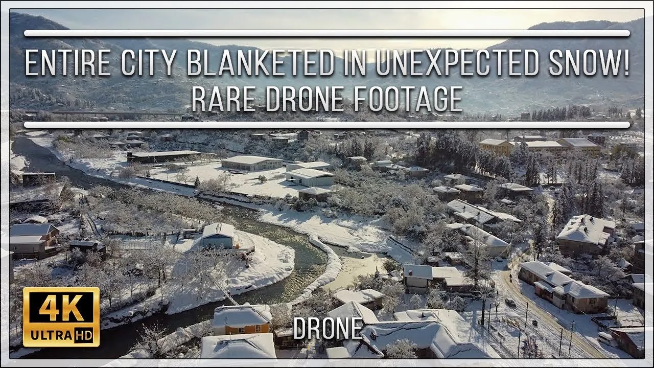 Rare Drone Footage Shows Entire City Blanketed in Unexpected Snow ...