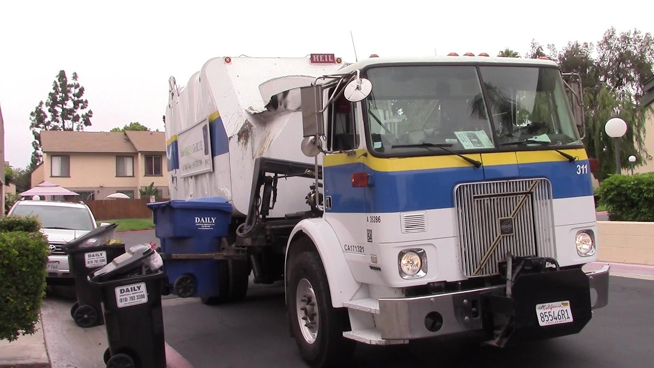 Daily Disposal: Volvo WX-42 / Heil Rapid Rail Recycling 311 - YouTube