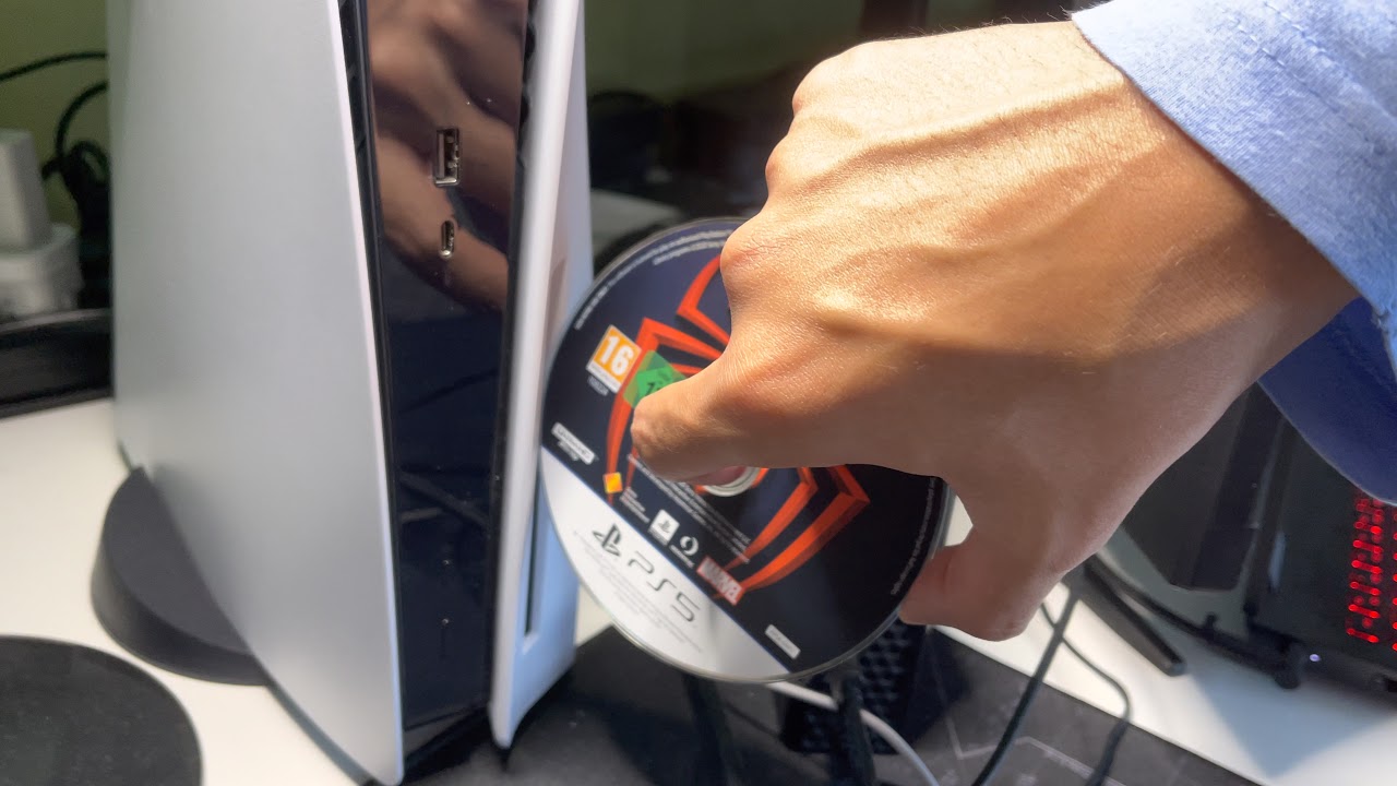 how to put PS5 disc in - YouTube