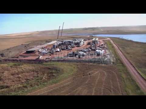 large fracking operation aerial wide 2 nku2rsuy - YouTube