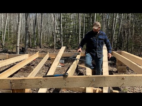 Building an off grid log cabin at the River living in the forest alone ...