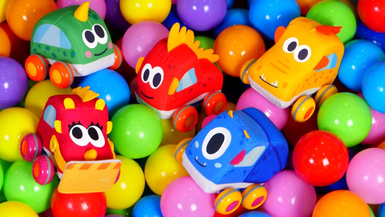 Come play with toy cars! Monster cars are playing on a playground ...