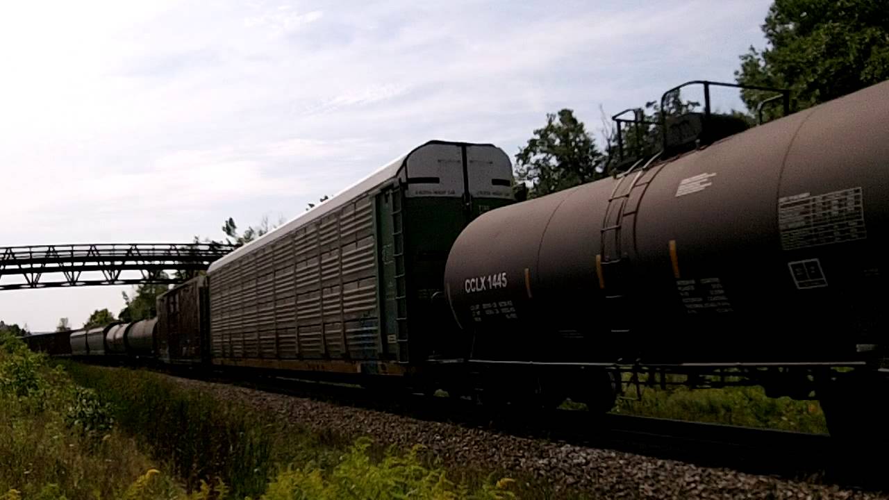 CN 422 w/ CN 8021, CN 2147 (ex BNSF 824) & CN 8856 lead this longg EB ...