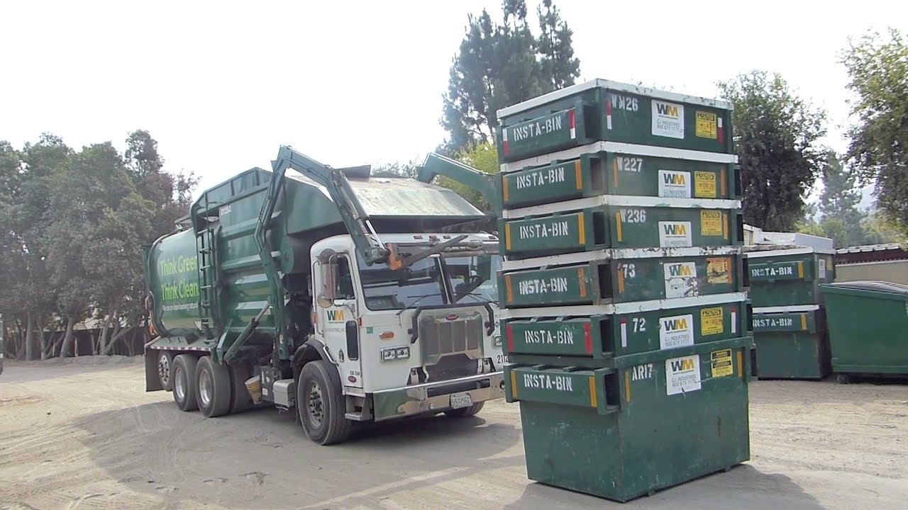 Waste Management Front Loader Collecting Stackable Dumpsters - YouTube